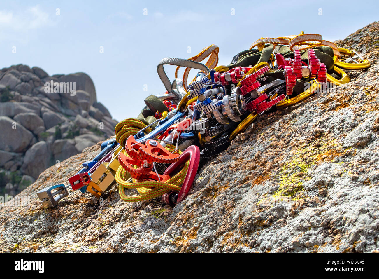 colorful rock climbing equipment on a rock outdoors Stock Photo - Alamy