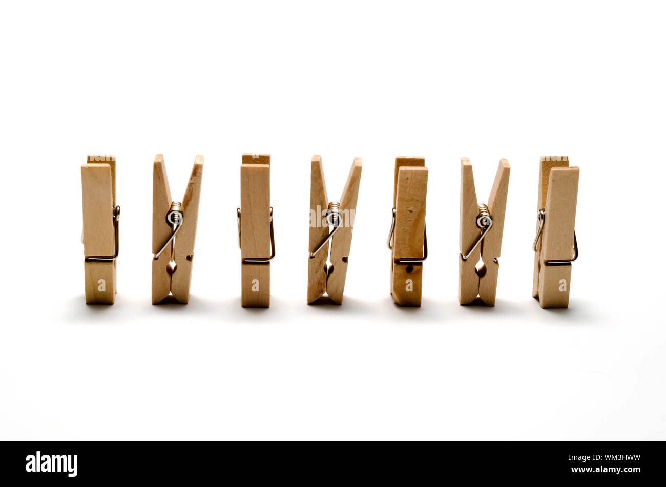 wood cloth pin on a white background Stock Photo - Alamy