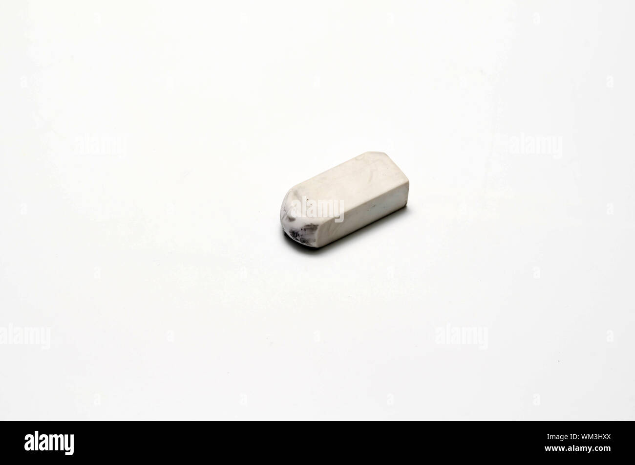 eraser on a white background Stock Photo - Alamy