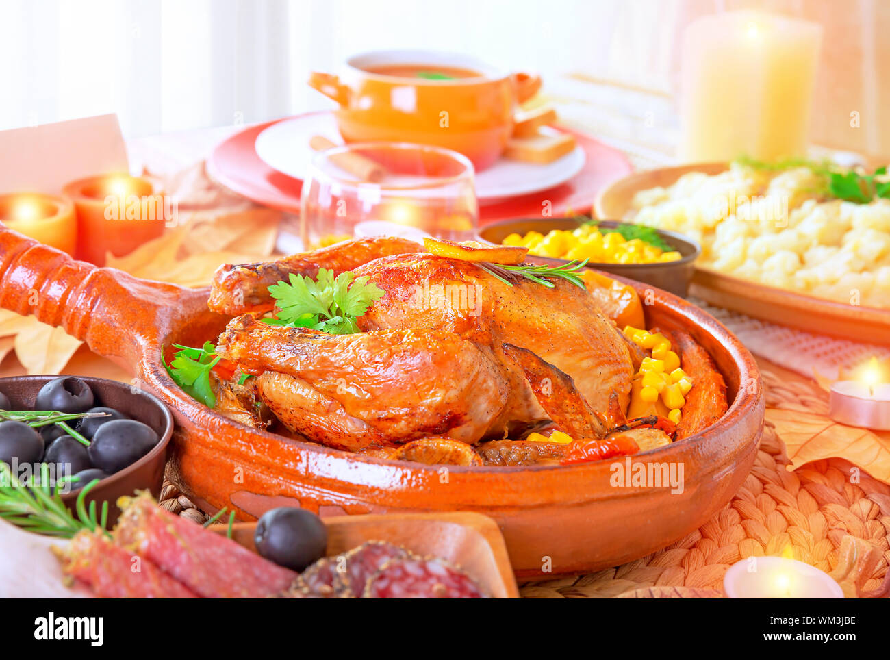 Traditional Thanksgiving family dinner with tasty grilled turkey in ...