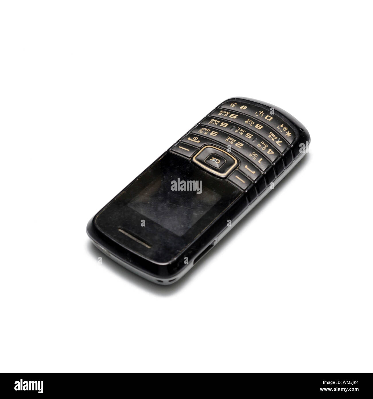 old mobile phone on a white background Stock Photo - Alamy