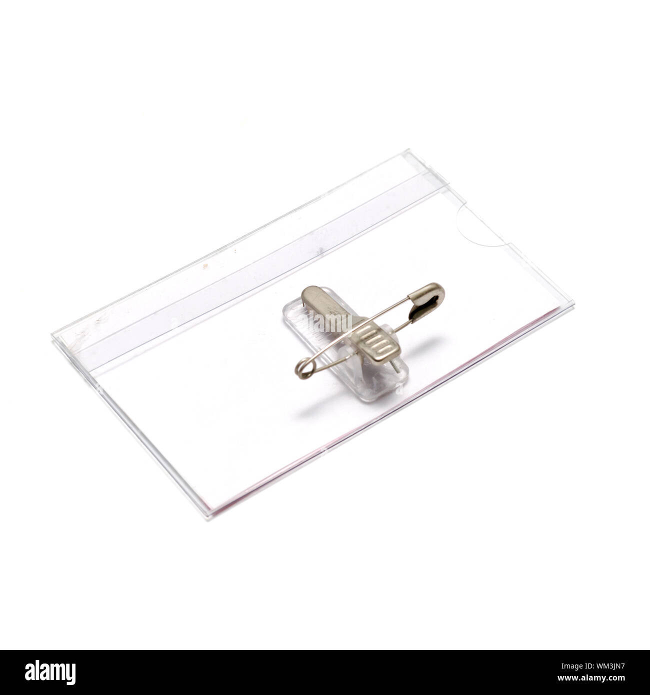 plastic name tag on a white background Stock Photo - Alamy