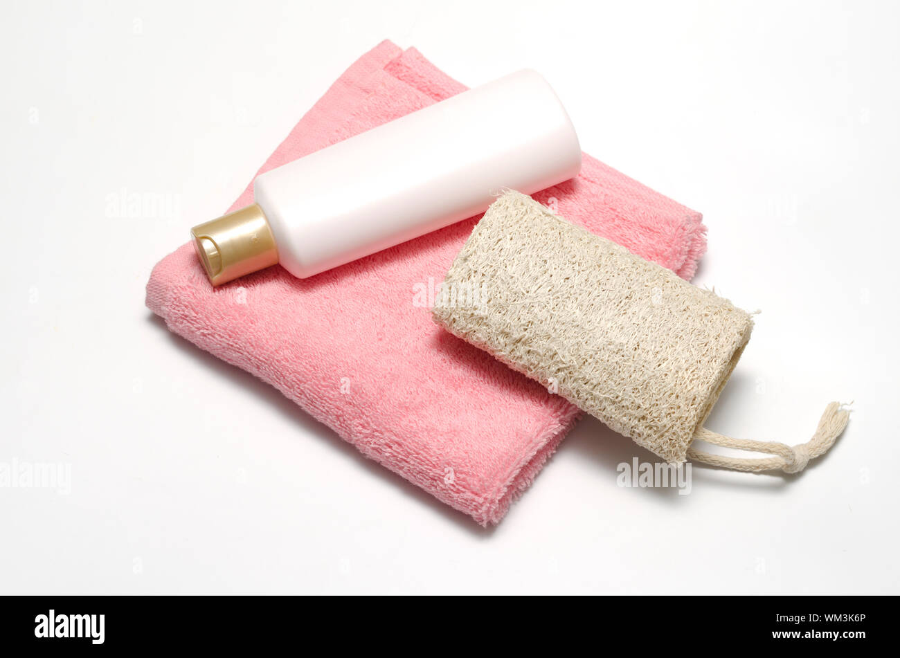 liquid soap loofah and towel Stock Photo - Alamy