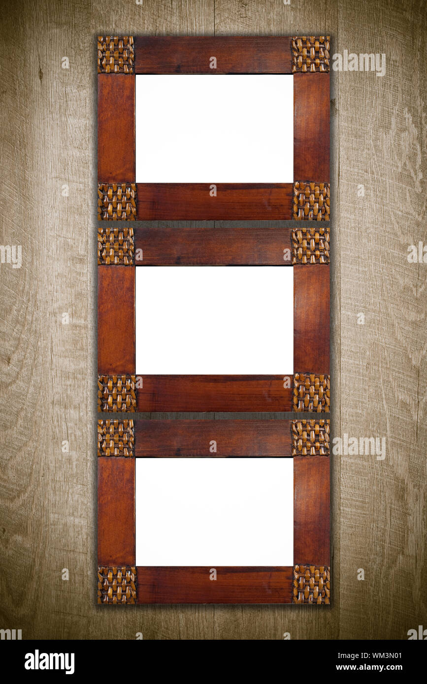 Old picture frame on vintage wood wall Stock Photo - Alamy
