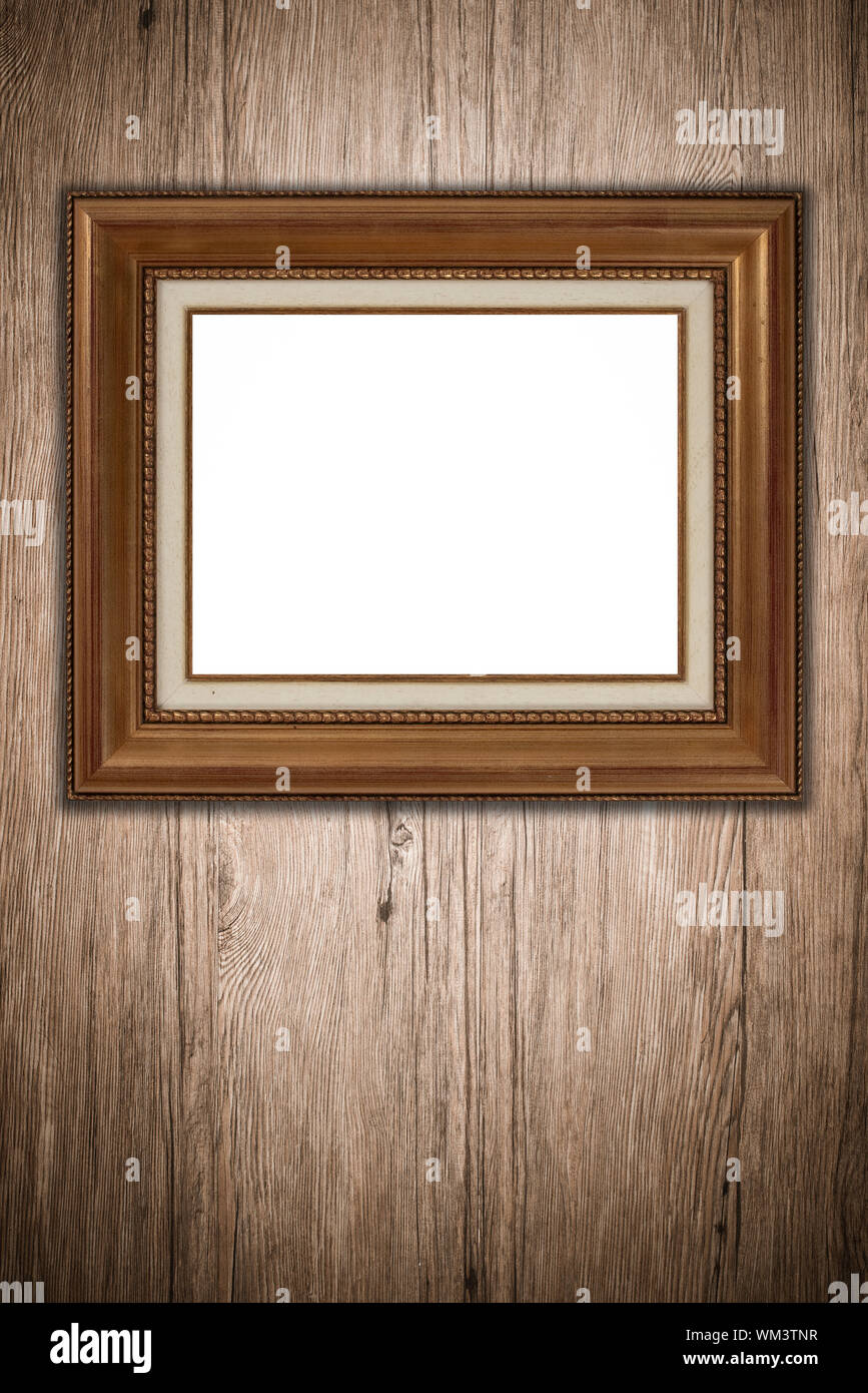 Old picture frame on vintage wood wall Stock Photo - Alamy