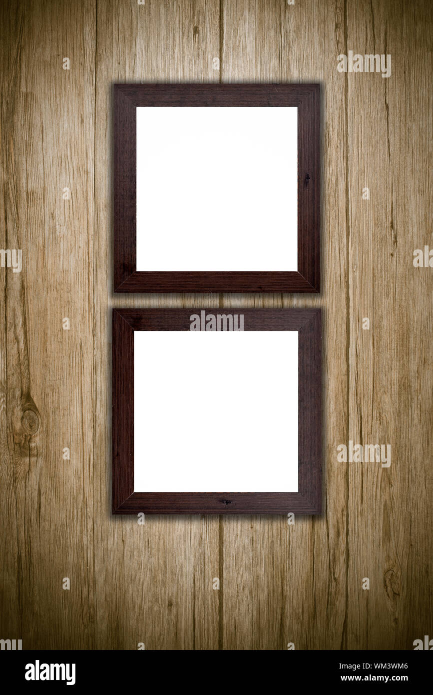 Old picture frame on vintage wood wall Stock Photo - Alamy
