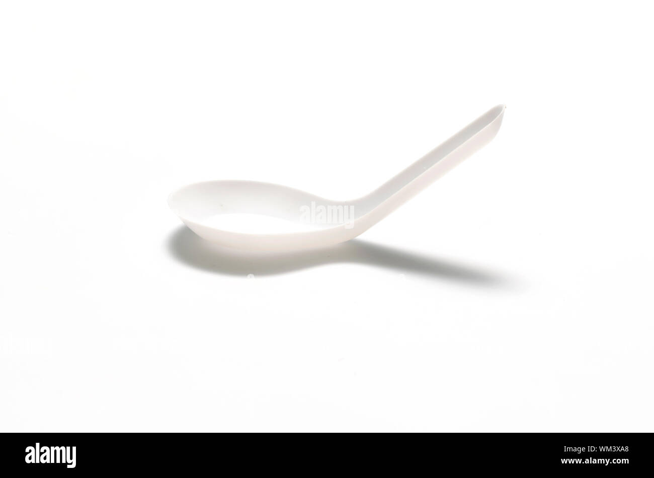 white plastic spoon Stock Photo - Alamy