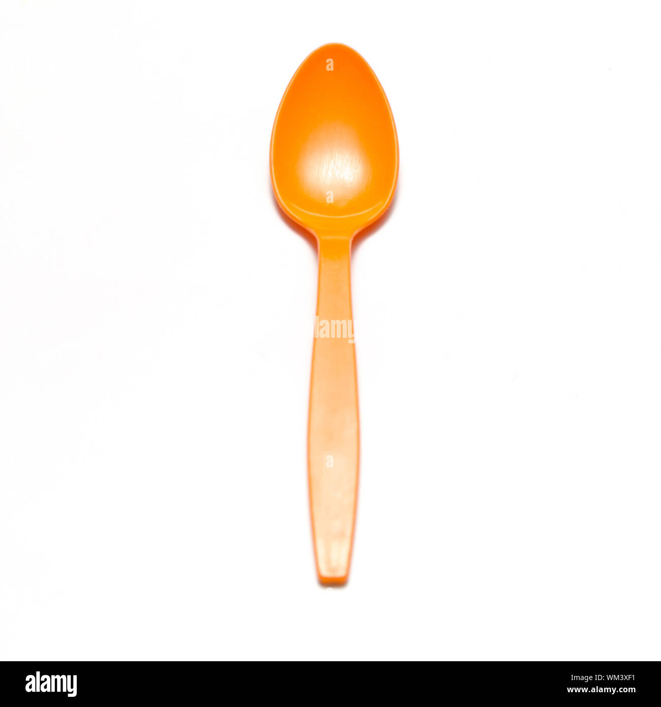 orange plastic spoon Stock Photo - Alamy