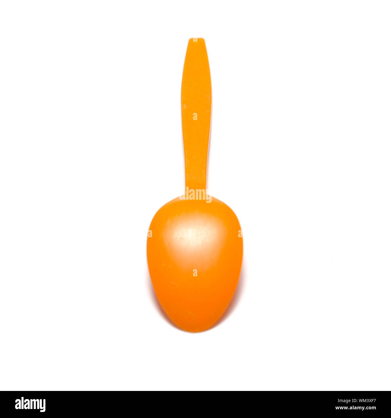 orange plastic spoon Stock Photo - Alamy