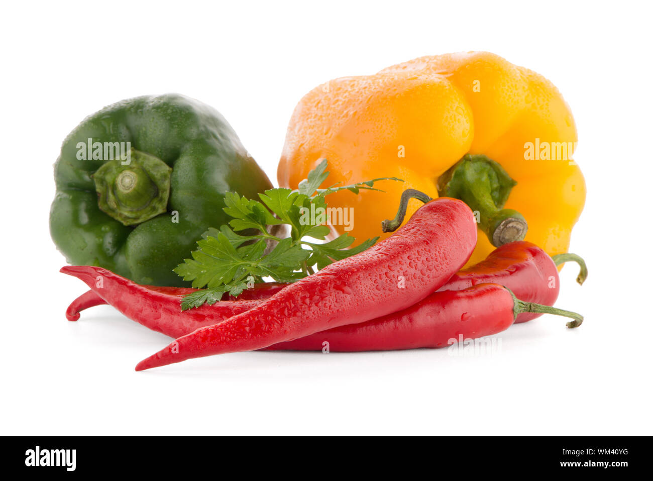 Mediterranean vegetables with red chilli peppers, parsley and bell ...