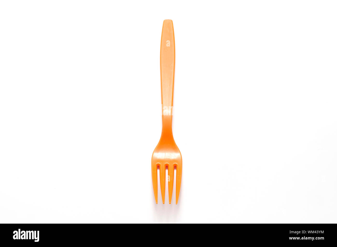 orange plastic fork Stock Photo - Alamy