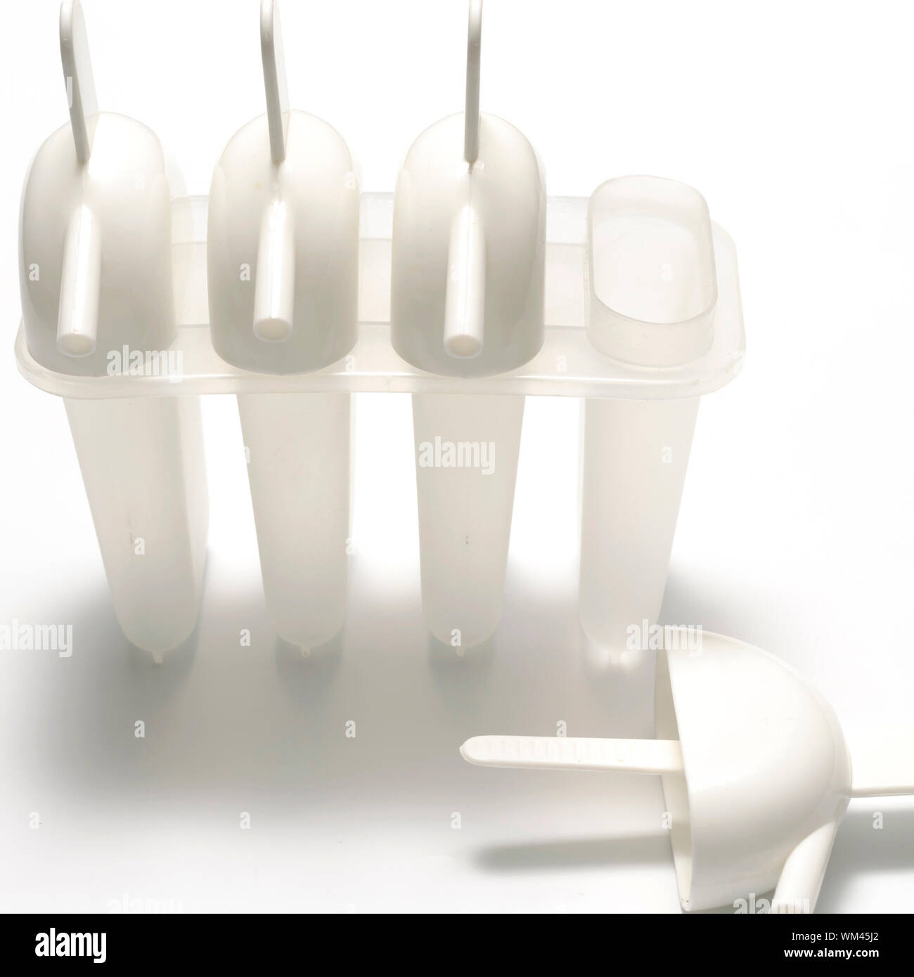 plastic ice cream making on a white background Stock Photo - Alamy