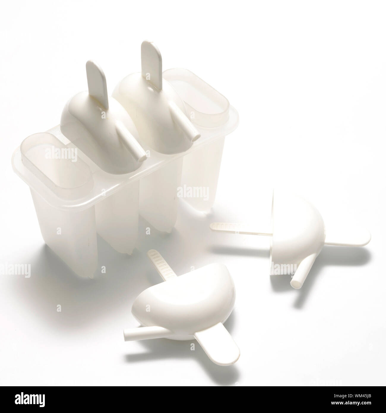 plastic ice cream making on a white background Stock Photo - Alamy