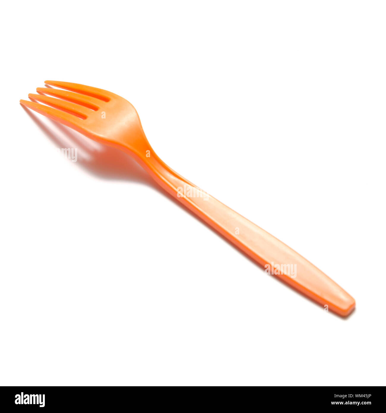 orange plastic fork Stock Photo - Alamy