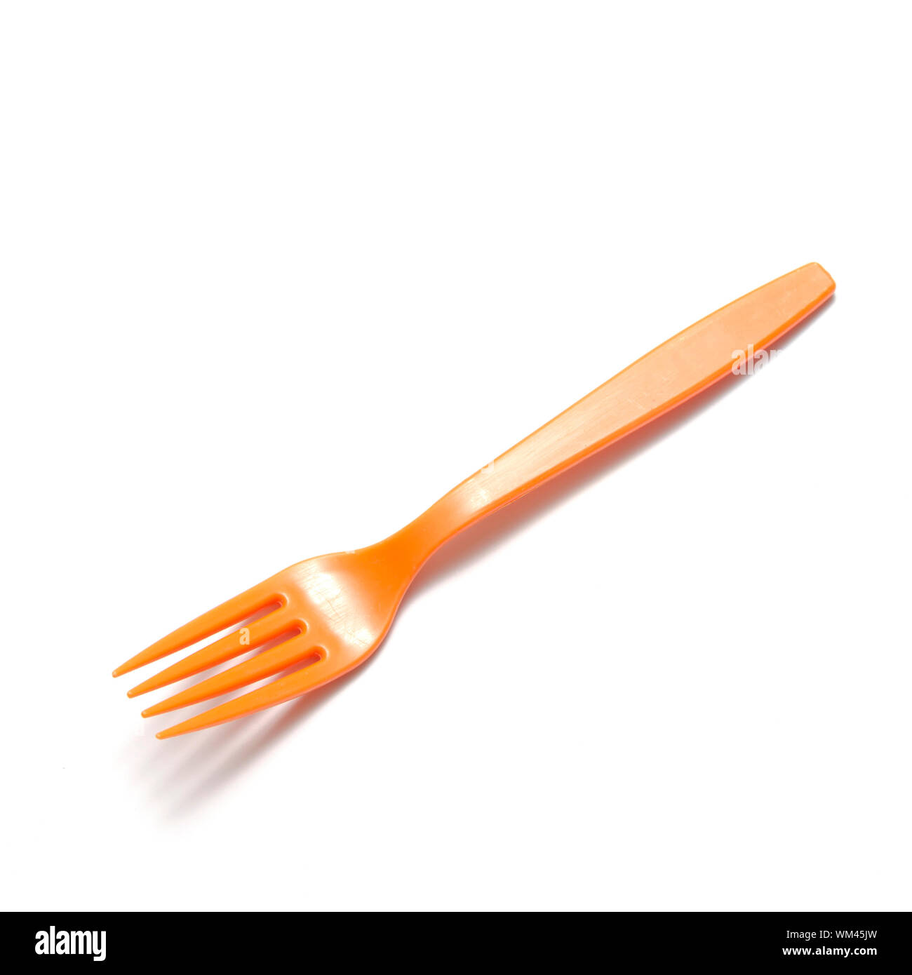 orange plastic fork Stock Photo - Alamy