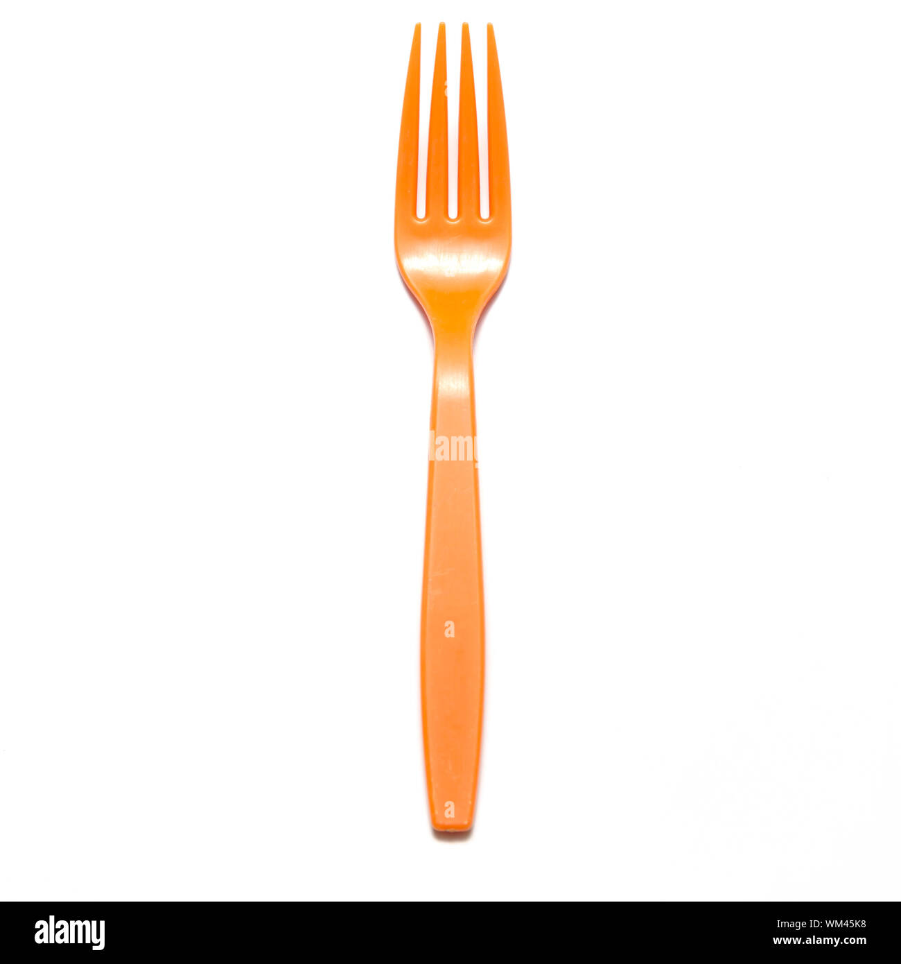 orange plastic fork Stock Photo - Alamy