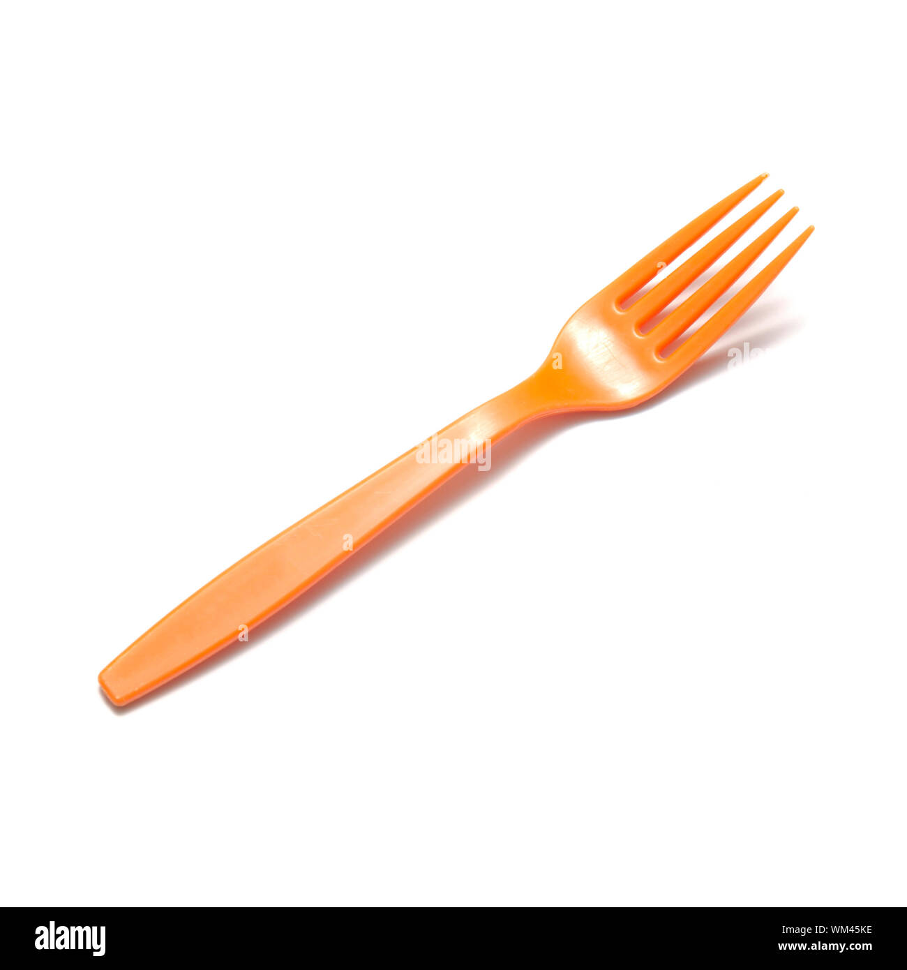orange plastic fork Stock Photo - Alamy