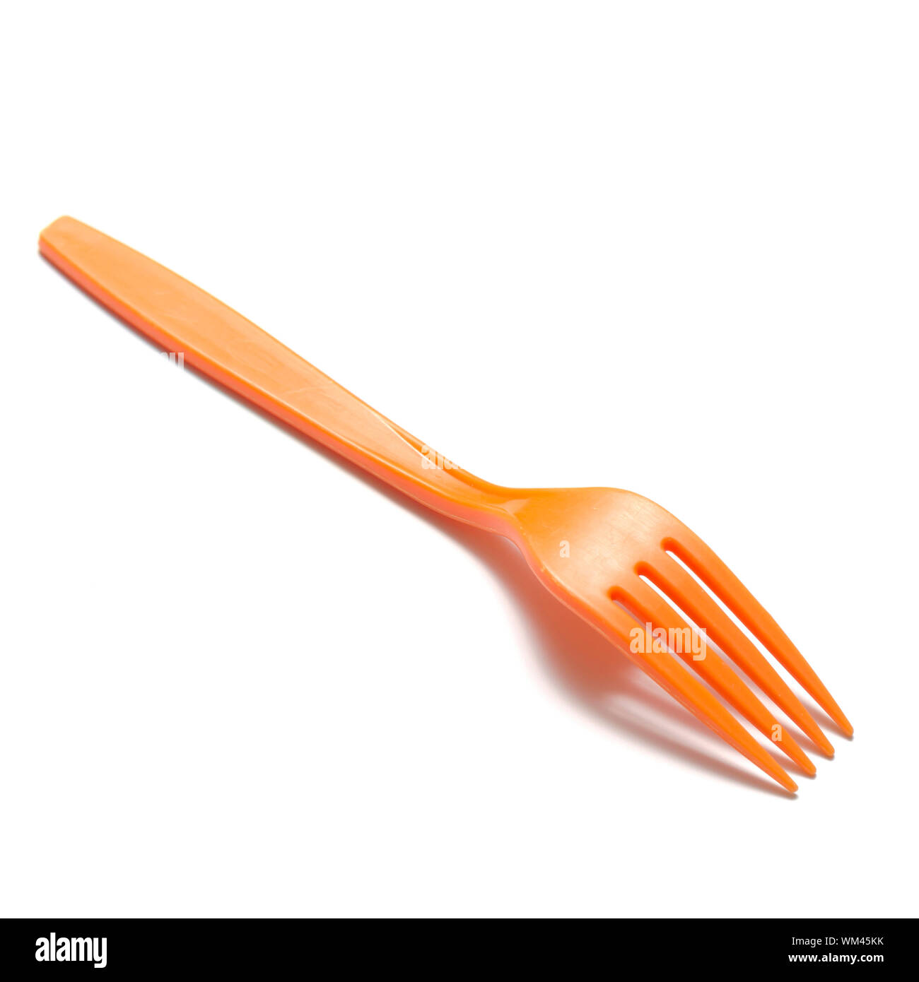 orange plastic fork Stock Photo - Alamy