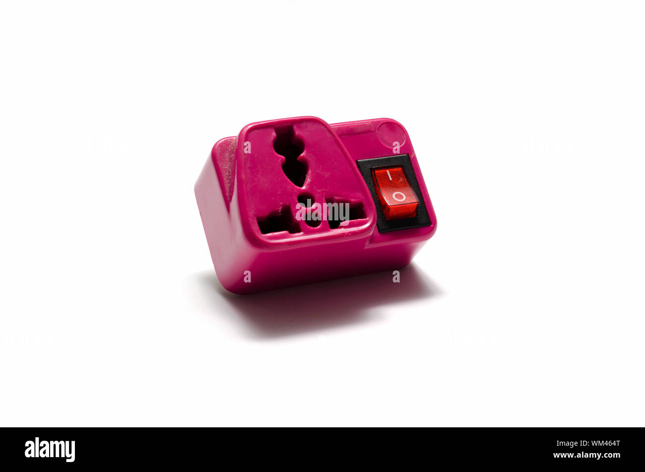 pink adapter plug on a white background Stock Photo - Alamy