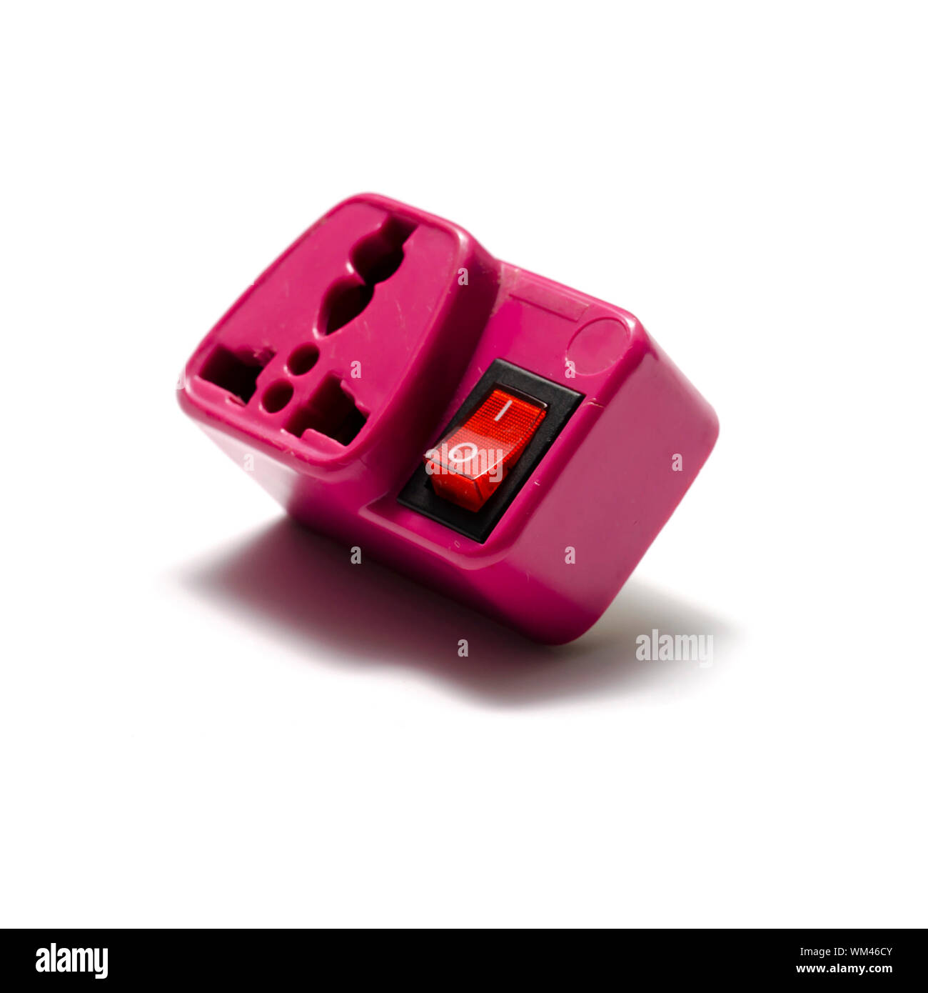 pink adapter plug on a white background Stock Photo - Alamy