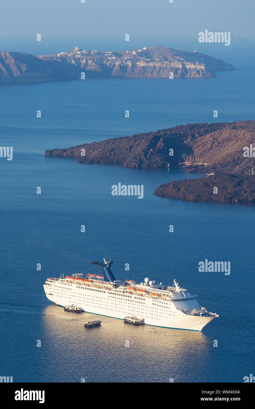 Luxury cruise ship sailing around Santorini island, Aegean sea in ...