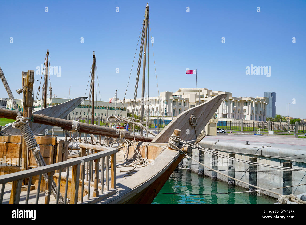 Moored dhow with rope rigging on Doha waterfront with Qatar House of ...