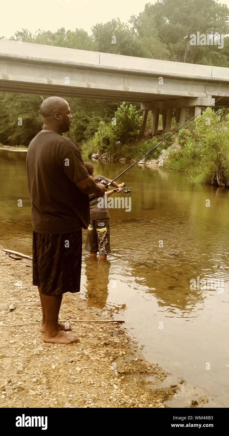 African american men fishing hi-res stock photography and images - Alamy