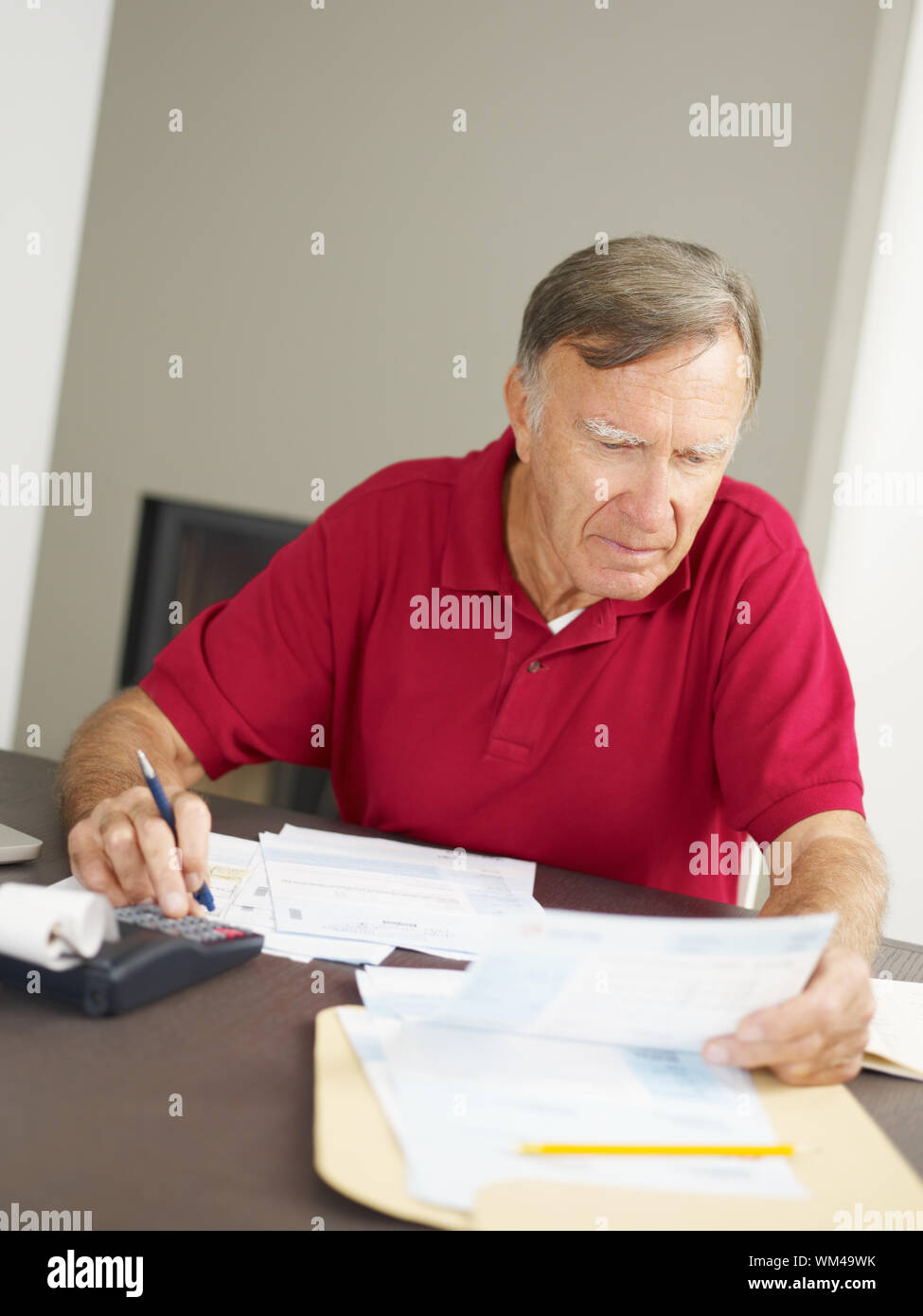 Senior man checking home finances. Copy space Stock Photo - Alamy