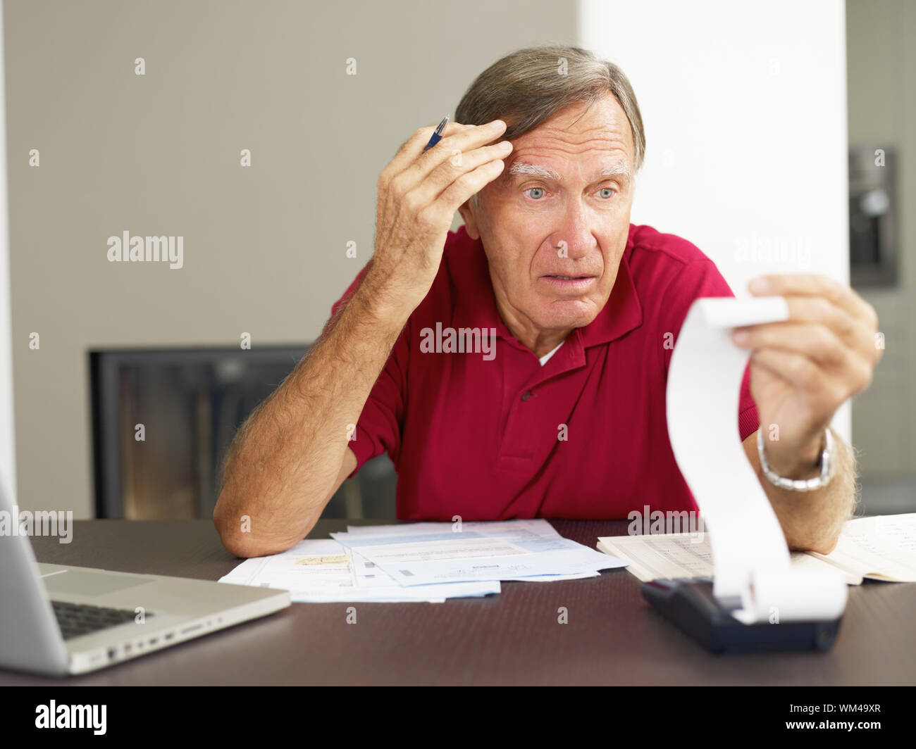 Senior man worried about his home finances. Copy space Stock Photo - Alamy