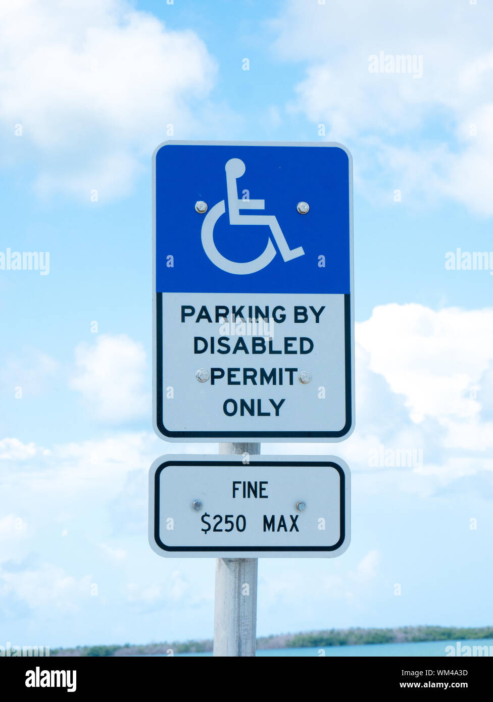 Disabled Parking Permit Sign ($250 Fine) on Blue Sky in the State of ...