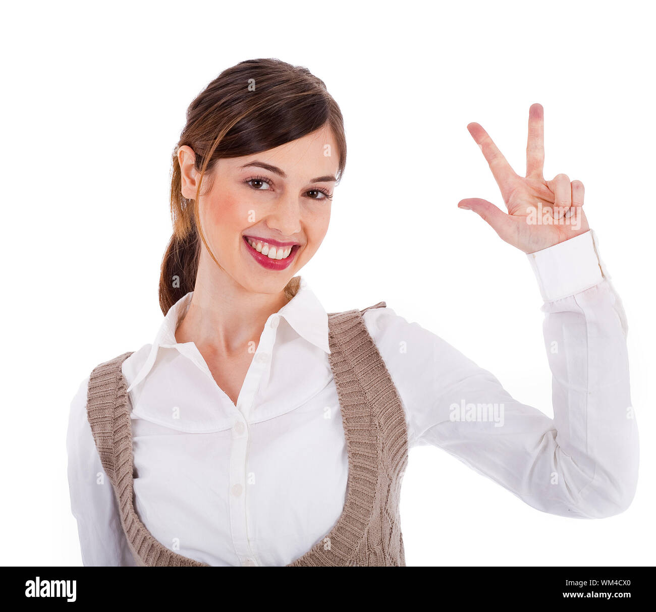 Beautiful young model raising her hand up and showing three fingers on ...