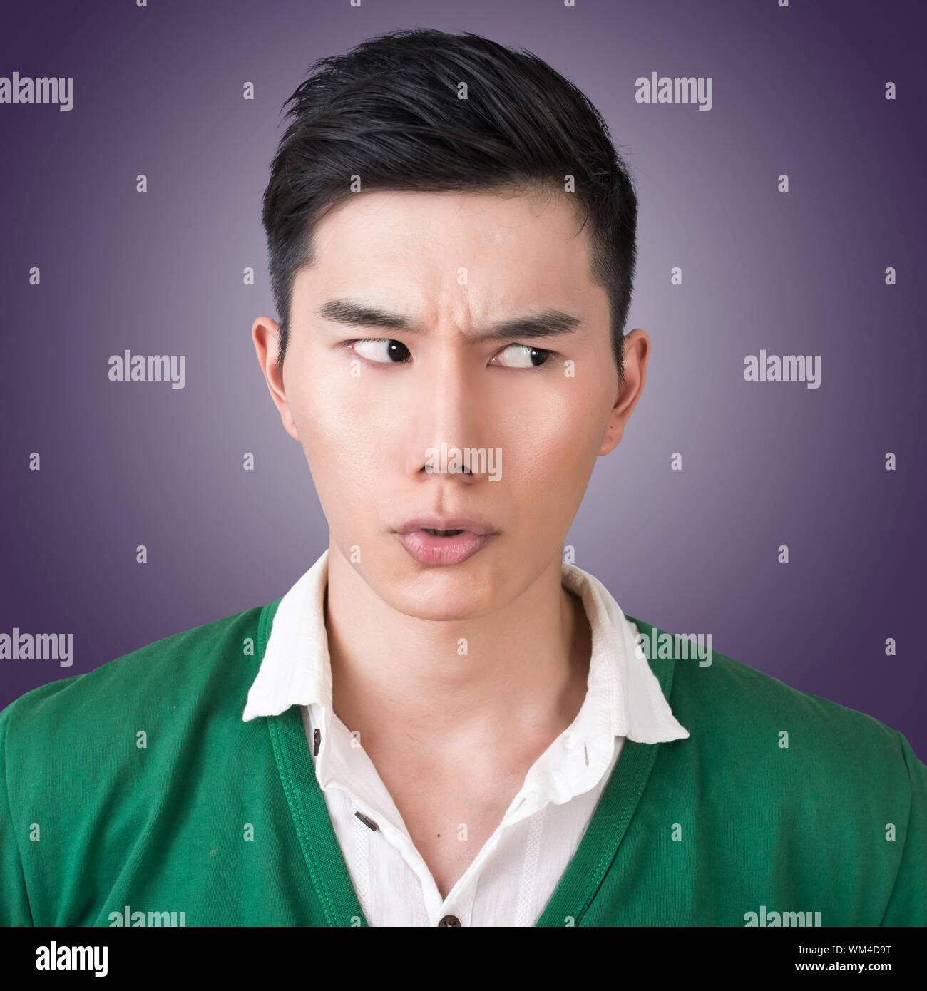 Funny facial expression, closeup Asian young man Stock Photo - Alamy