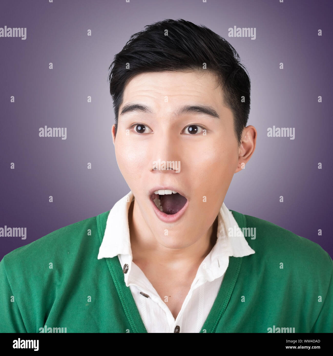 Funny facial expression, closeup Asian young man Stock Photo - Alamy