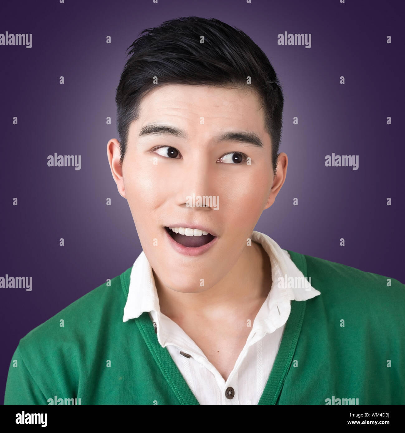 Funny facial expression, closeup Asian young man Stock Photo - Alamy