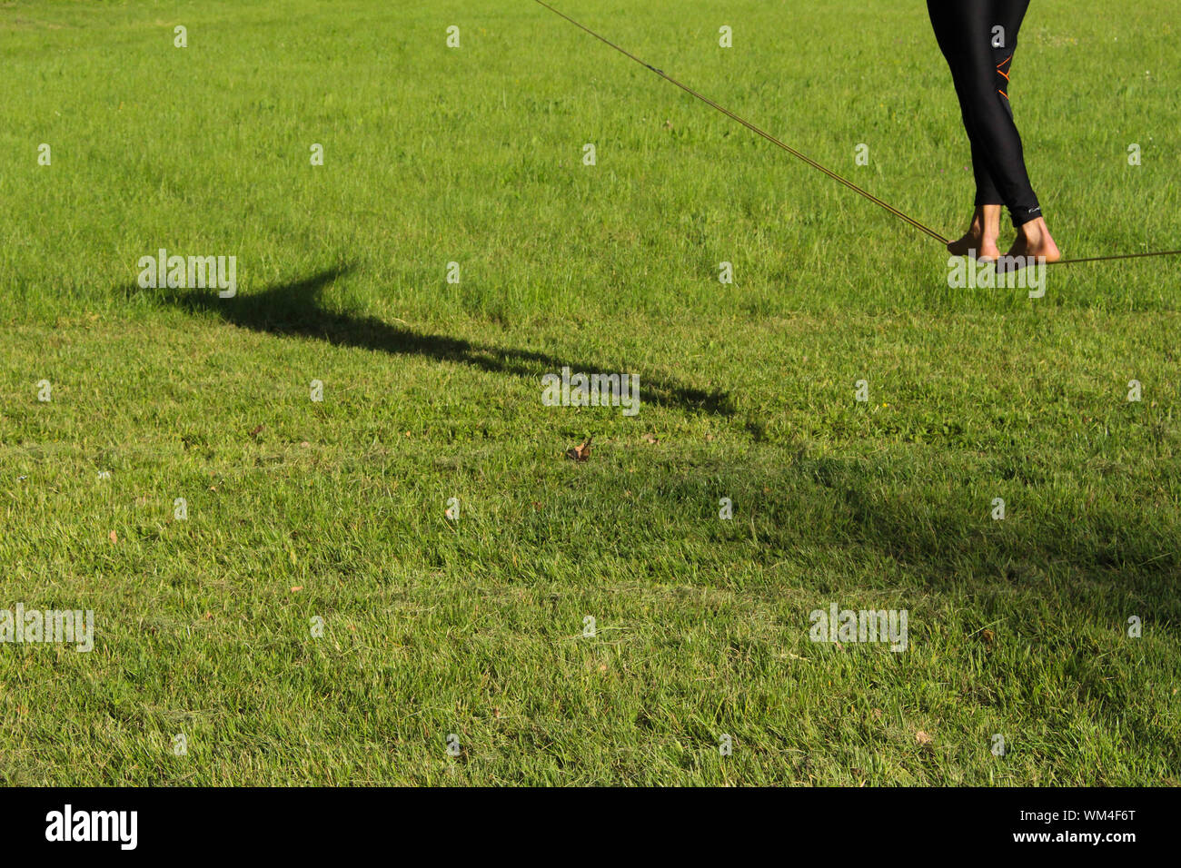 Balancing tightrope hi-res stock photography and images - Alamy