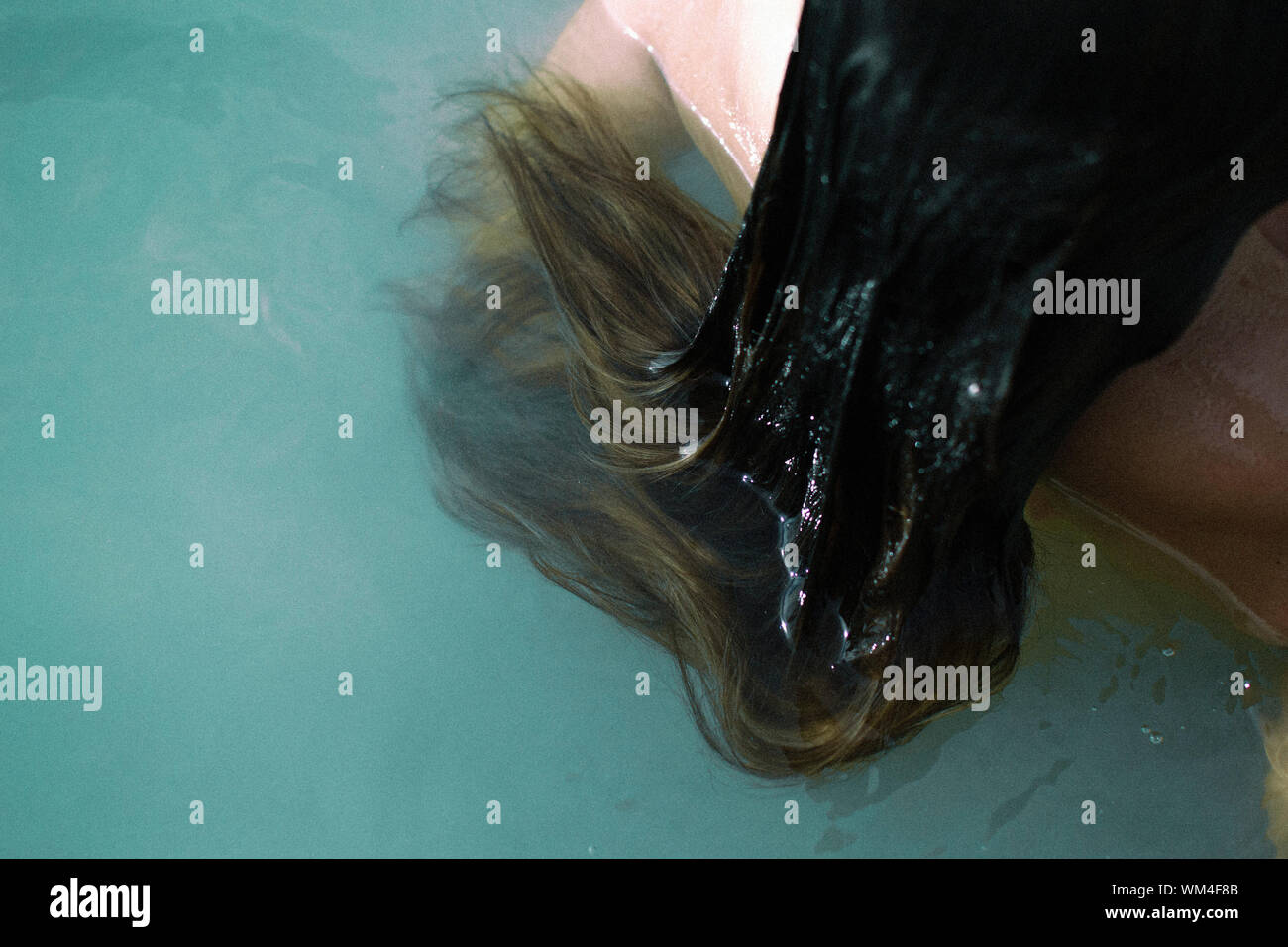 Woman pool swimming long hair hi-res stock photography and images - Alamy