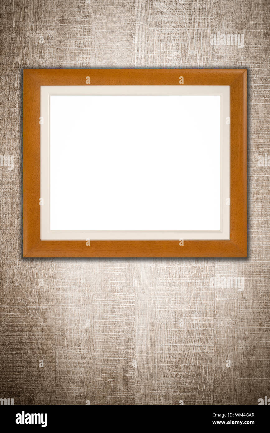 Old picture frame on vintage wood wall Stock Photo - Alamy