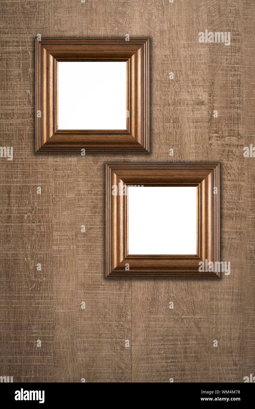 Old picture frame on vintage wood wall Stock Photo - Alamy