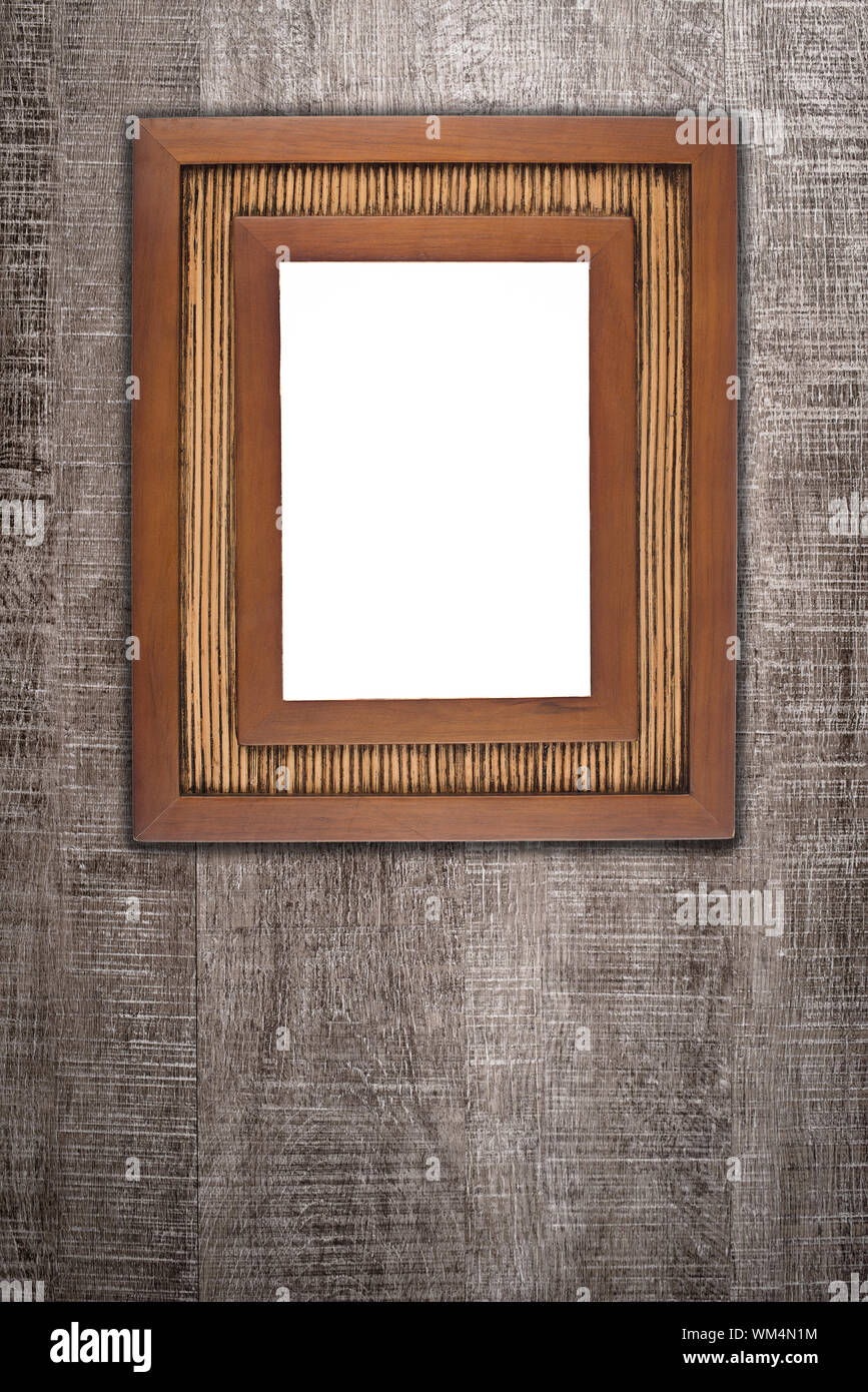 Old picture frame on vintage wood wall Stock Photo - Alamy