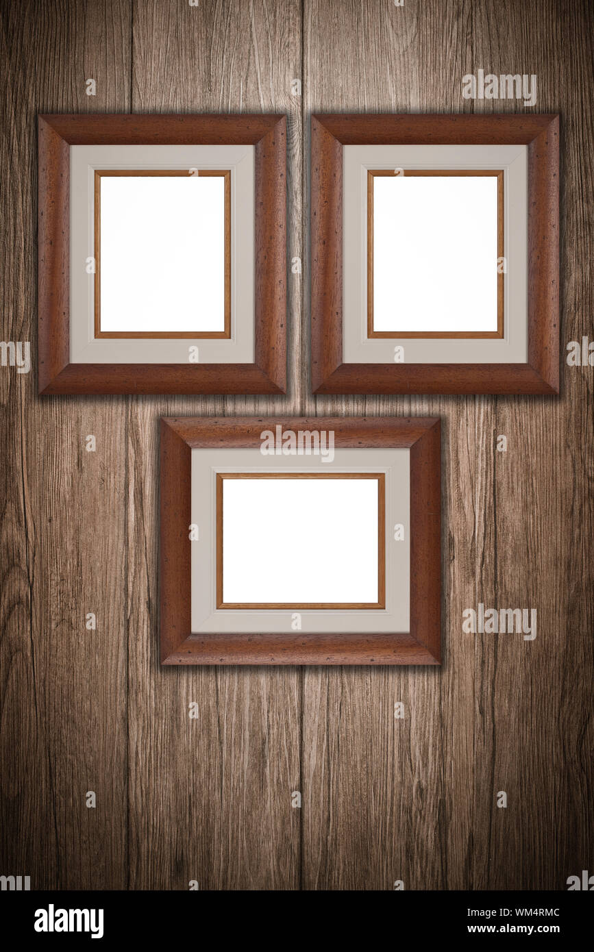 Old picture frame on vintage wood wall Stock Photo - Alamy