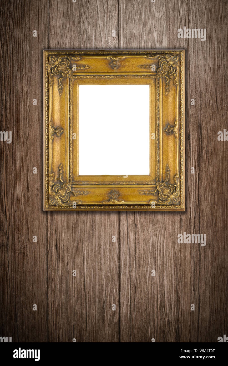 Old picture frame on vintage wood wall Stock Photo - Alamy