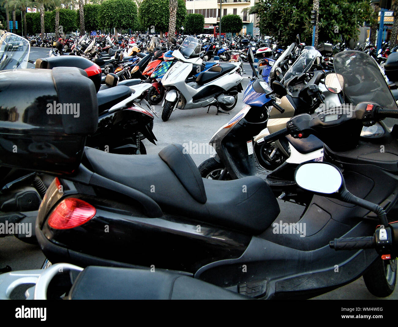 Motor scooters parked hi-res stock photography and images - Alamy