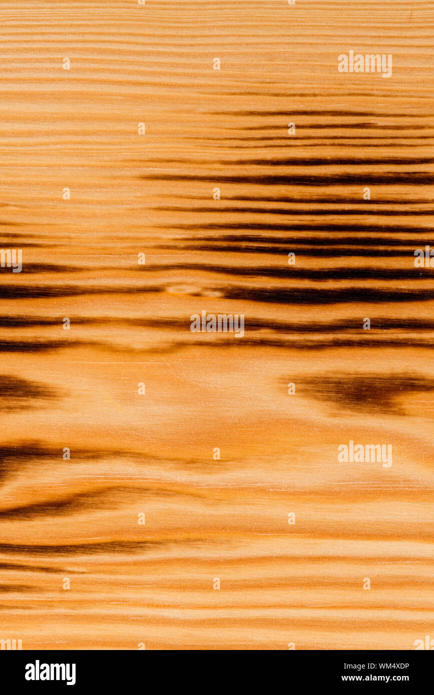 Closeup of natural burned pine wood background Stock Photo - Alamy