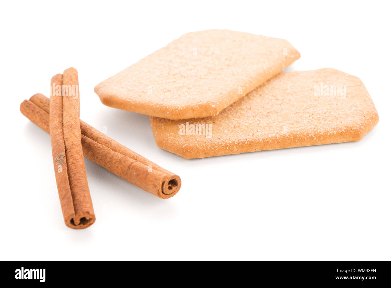 Cinnamon cookies and cinnamon sticks isolated on white background Stock ...