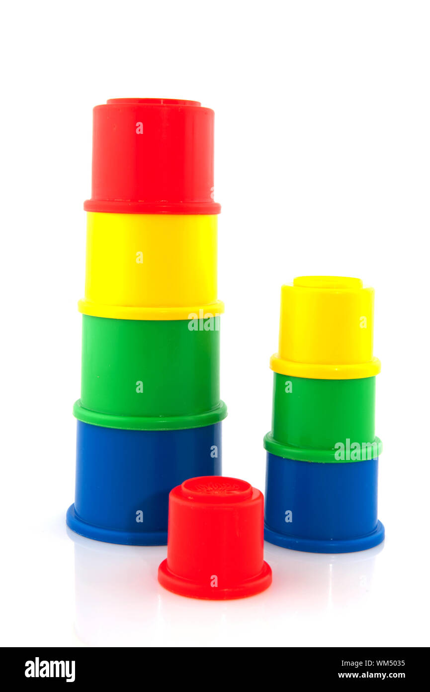 building towers with colorful blocks isolated over white Stock Photo ...