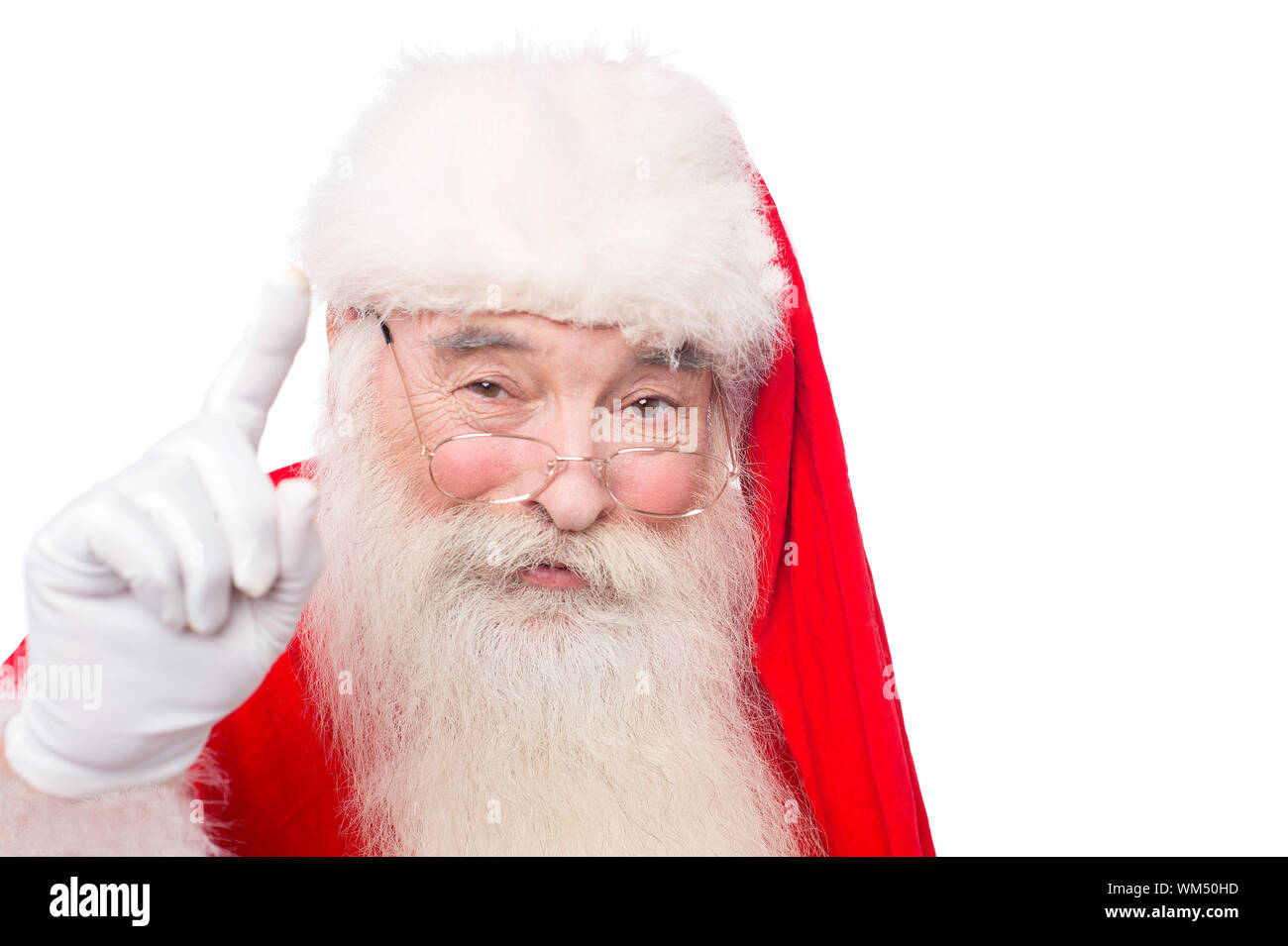 Santa claus raising his finger Stock Photo - Alamy
