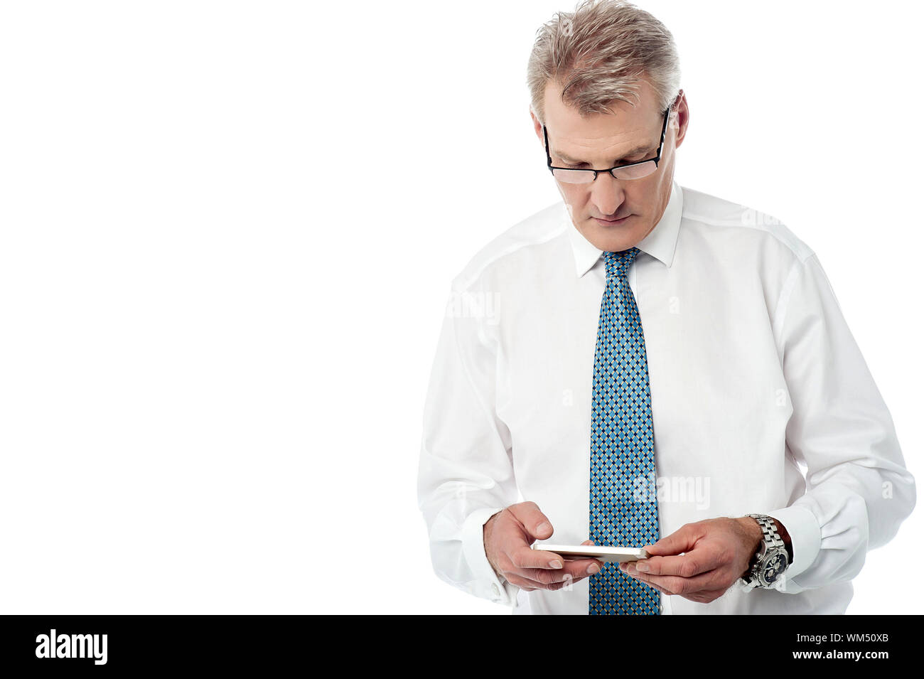 Man looking down mobile phone Cut Out Stock Images & Pictures - Alamy