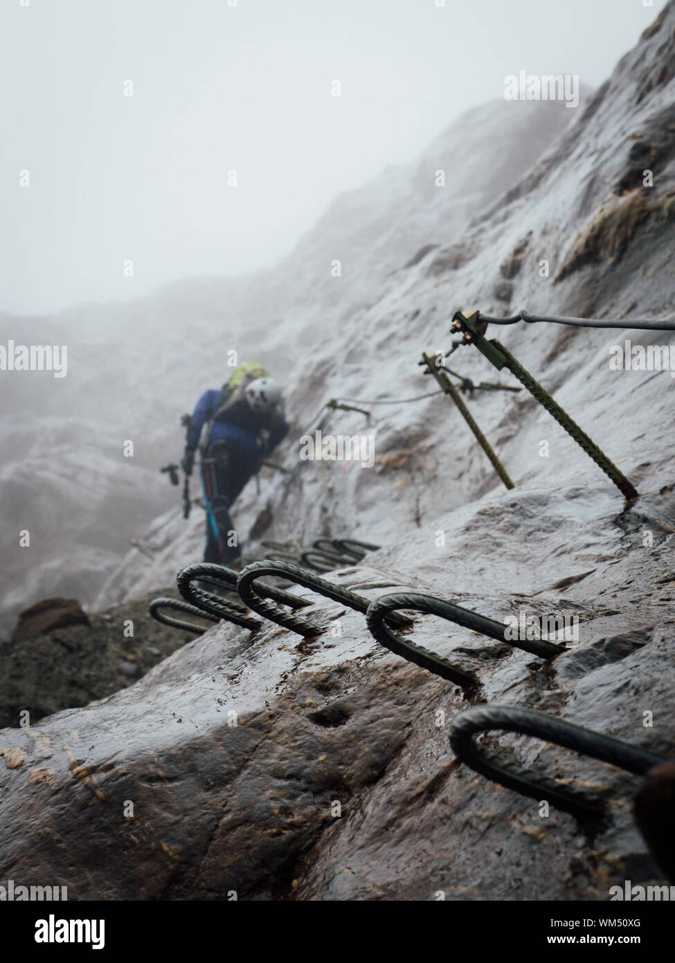 Man climbing a mountain hi-res stock photography and images - Alamy