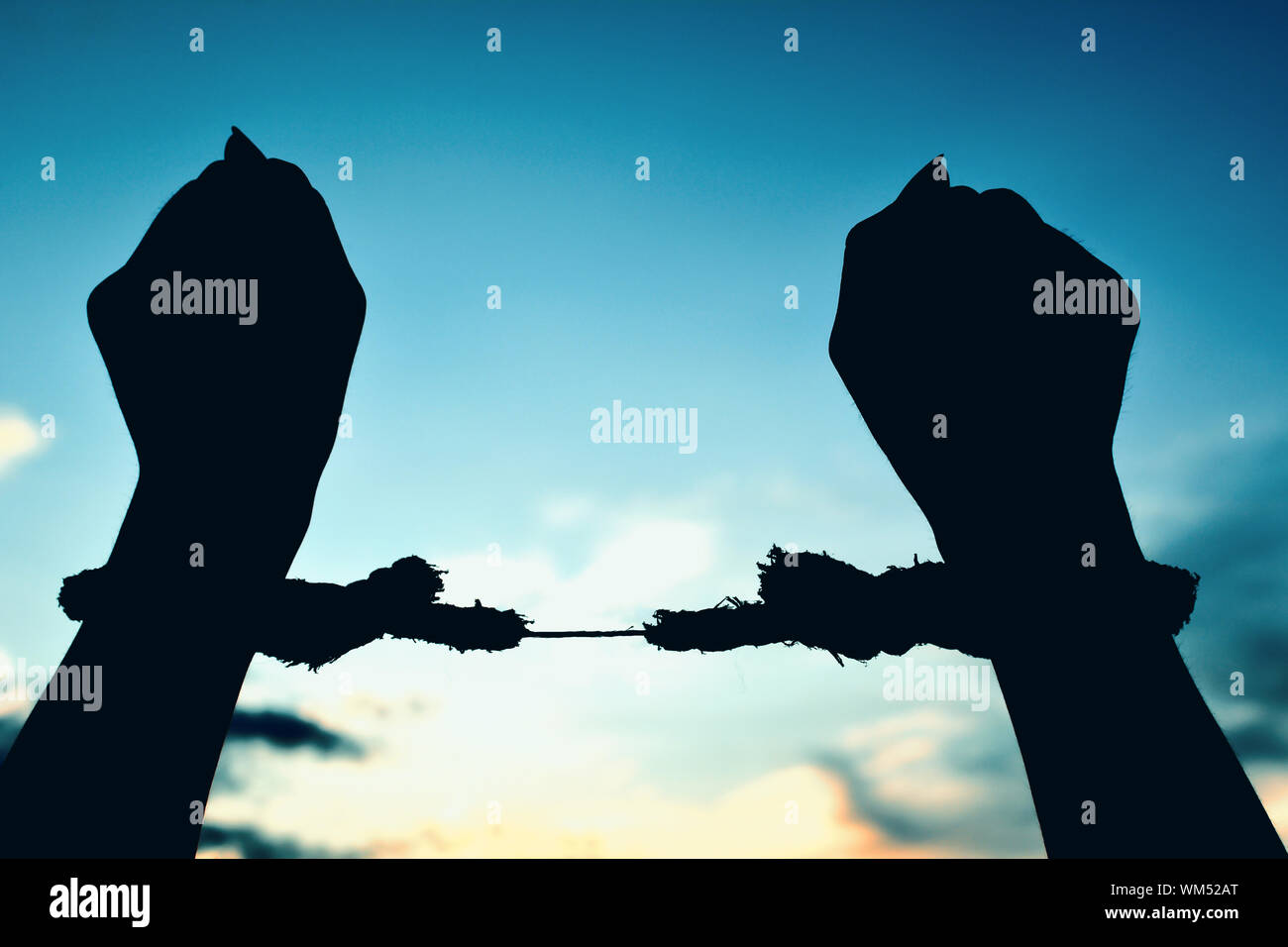 Tied hands silhouette hi-res stock photography and images - Alamy