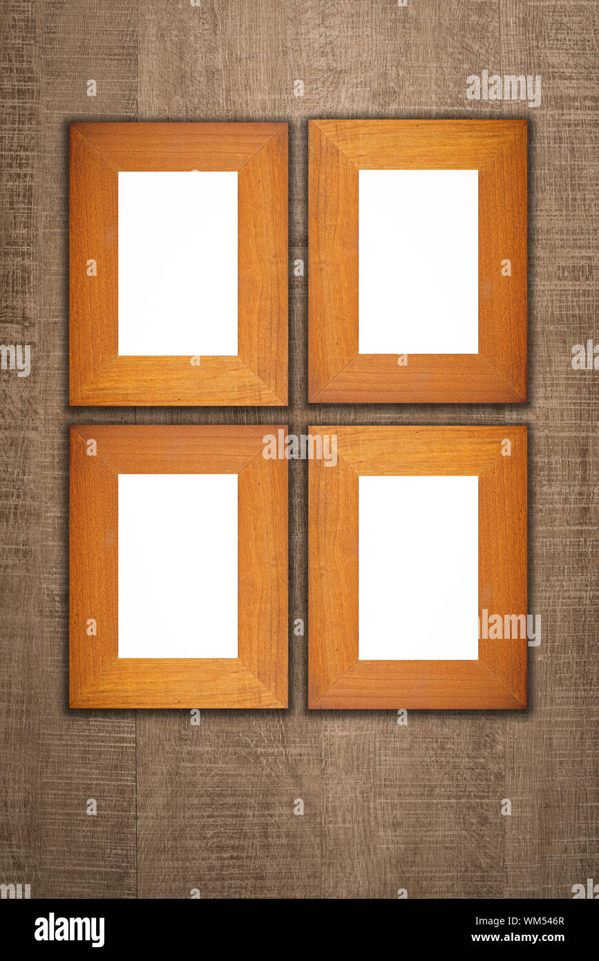 Old picture frame on vintage wood wall Stock Photo - Alamy
